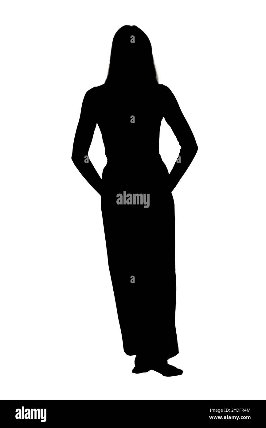 A striking silhouette of a woman dressed elegantly in a long flowing ...