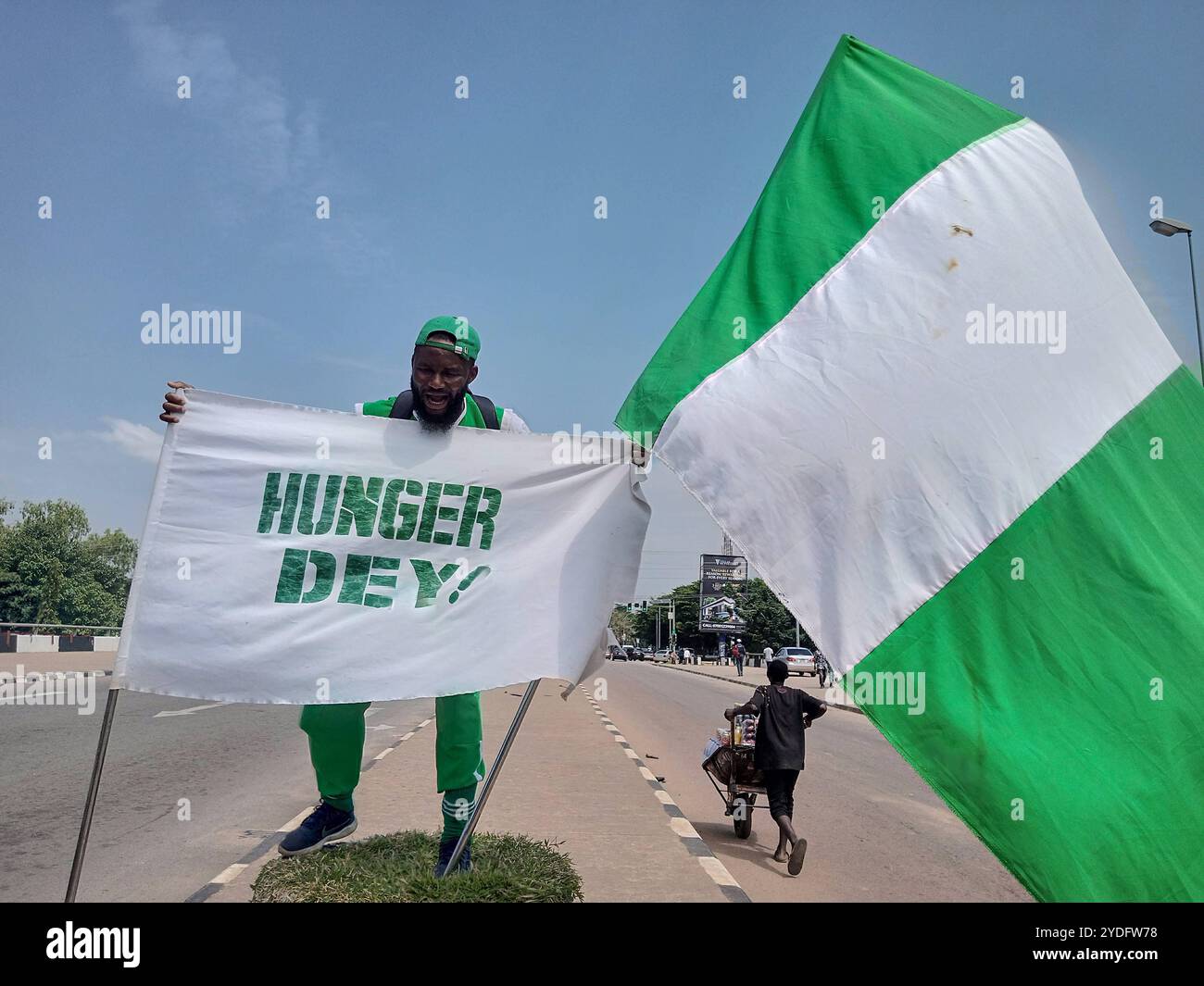 Food shortage protest in Abuja, Nigeria A Nigerian man known as Flagman ...