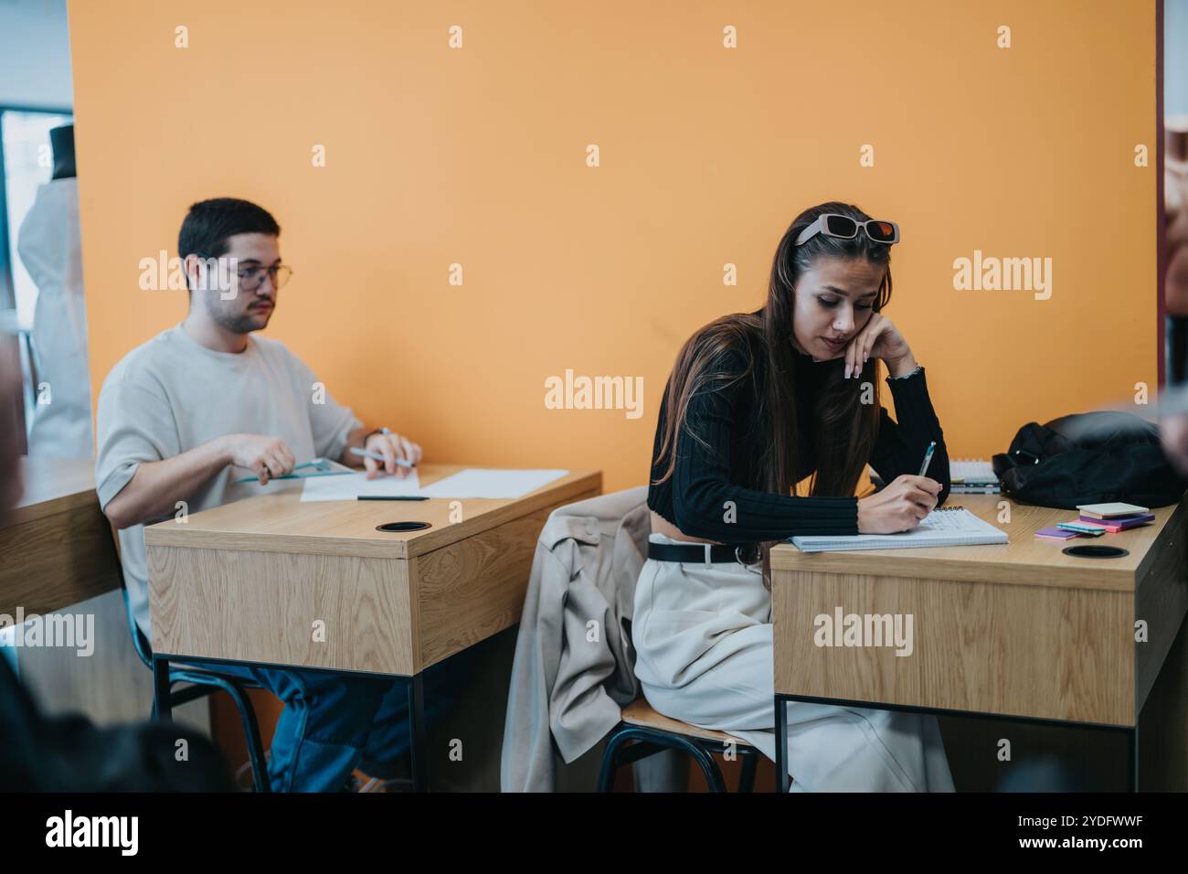 Focused pupils sitting in classroom hi-res stock photography and images ...