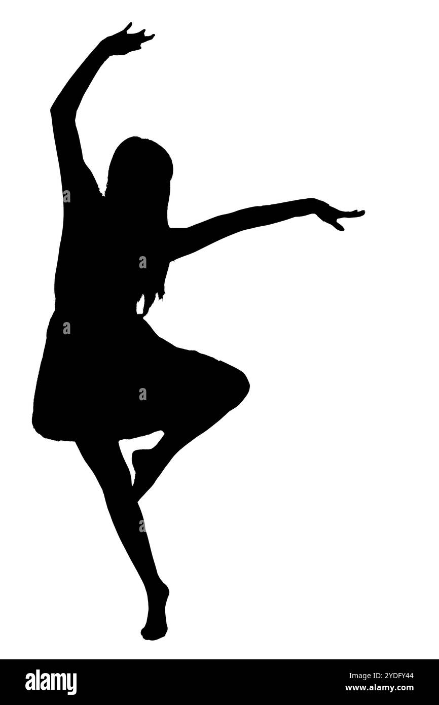 A captivating silhouette of a graceful woman dancing joyfully against a ...