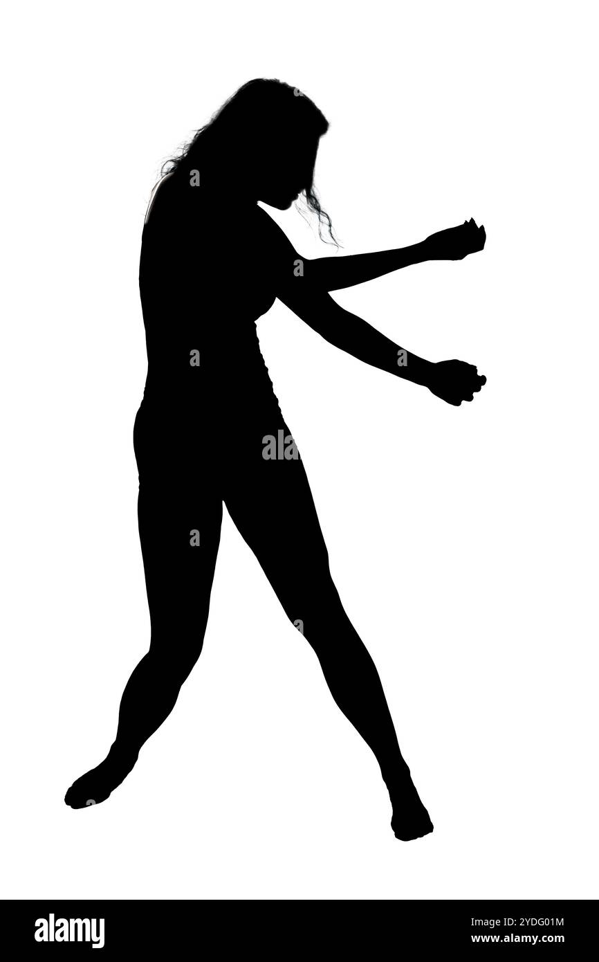 A graceful silhouette of a woman dancing elegantly on a white ...