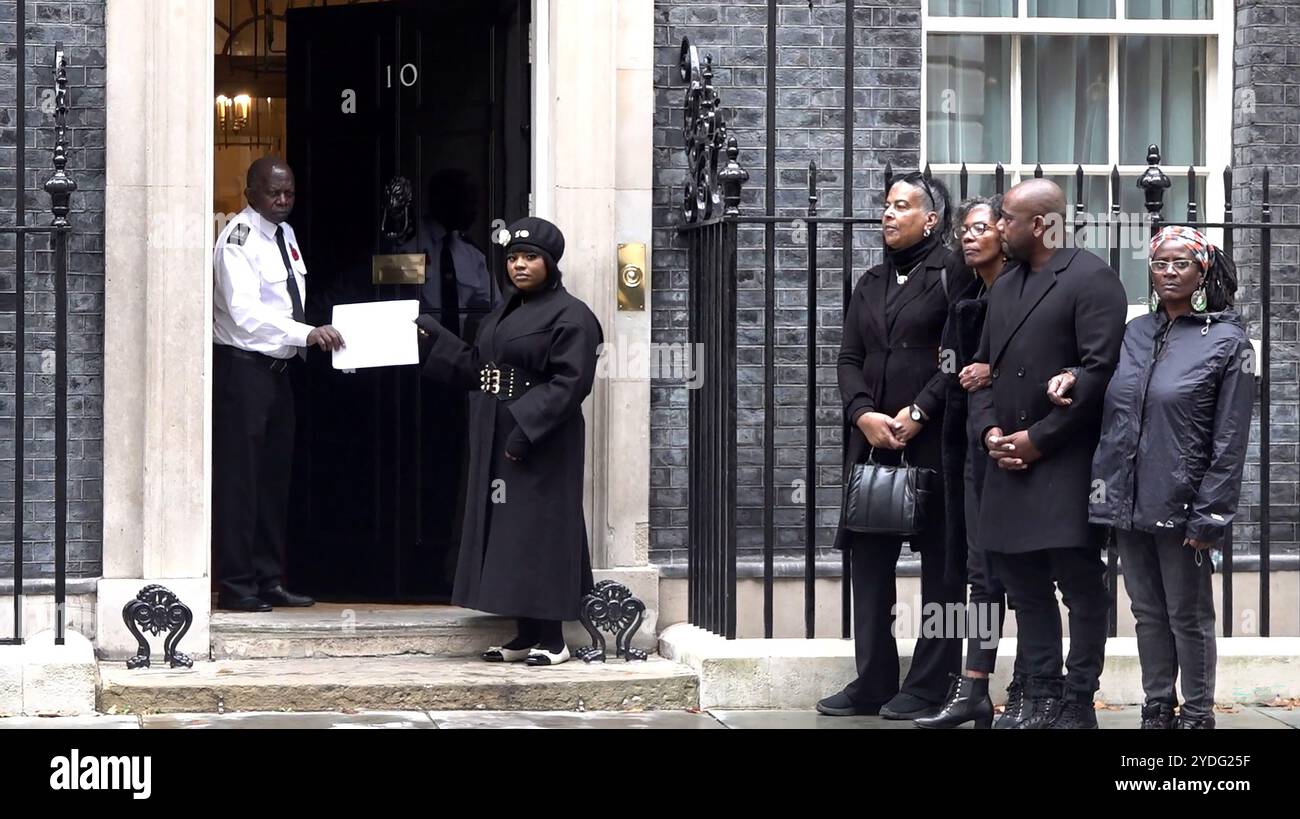 Screen grab taken from PA Video of the family of Chris Kaba delivering ...