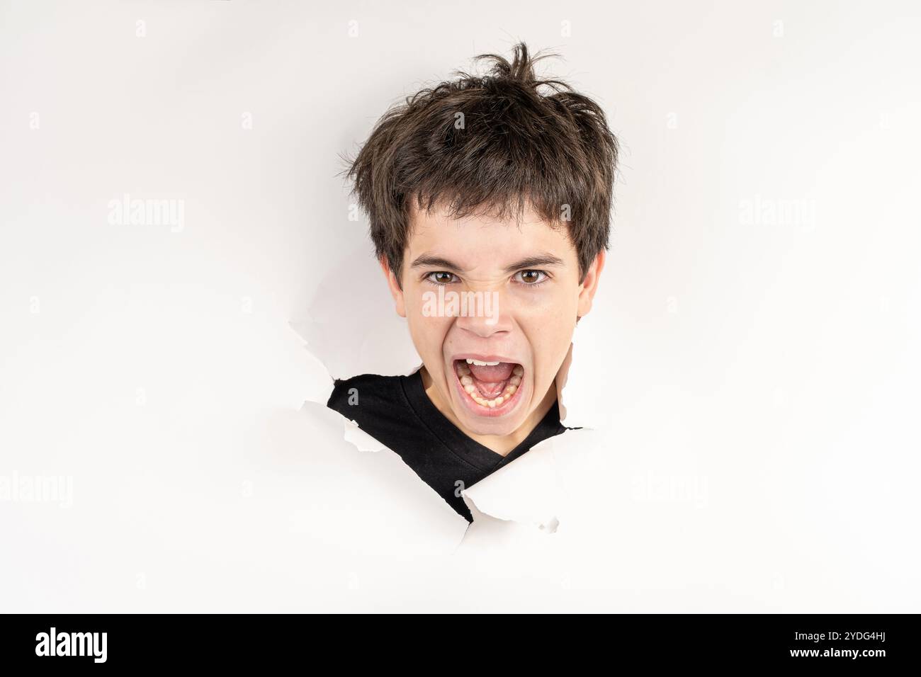 11 year old Brazilian child with only his head on a torn cardboard ...