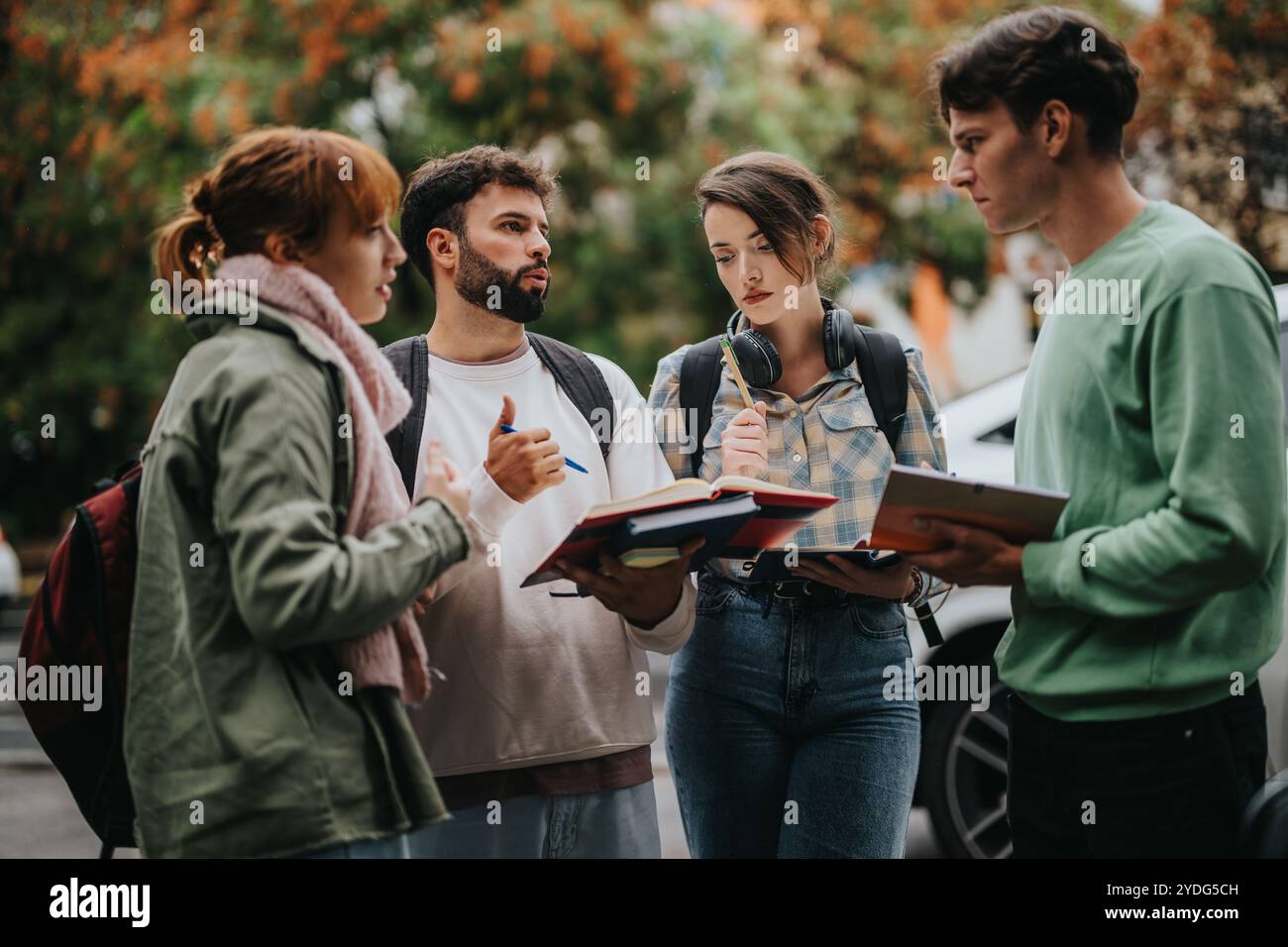 College students discussion outdoors hi-res stock photography and ...