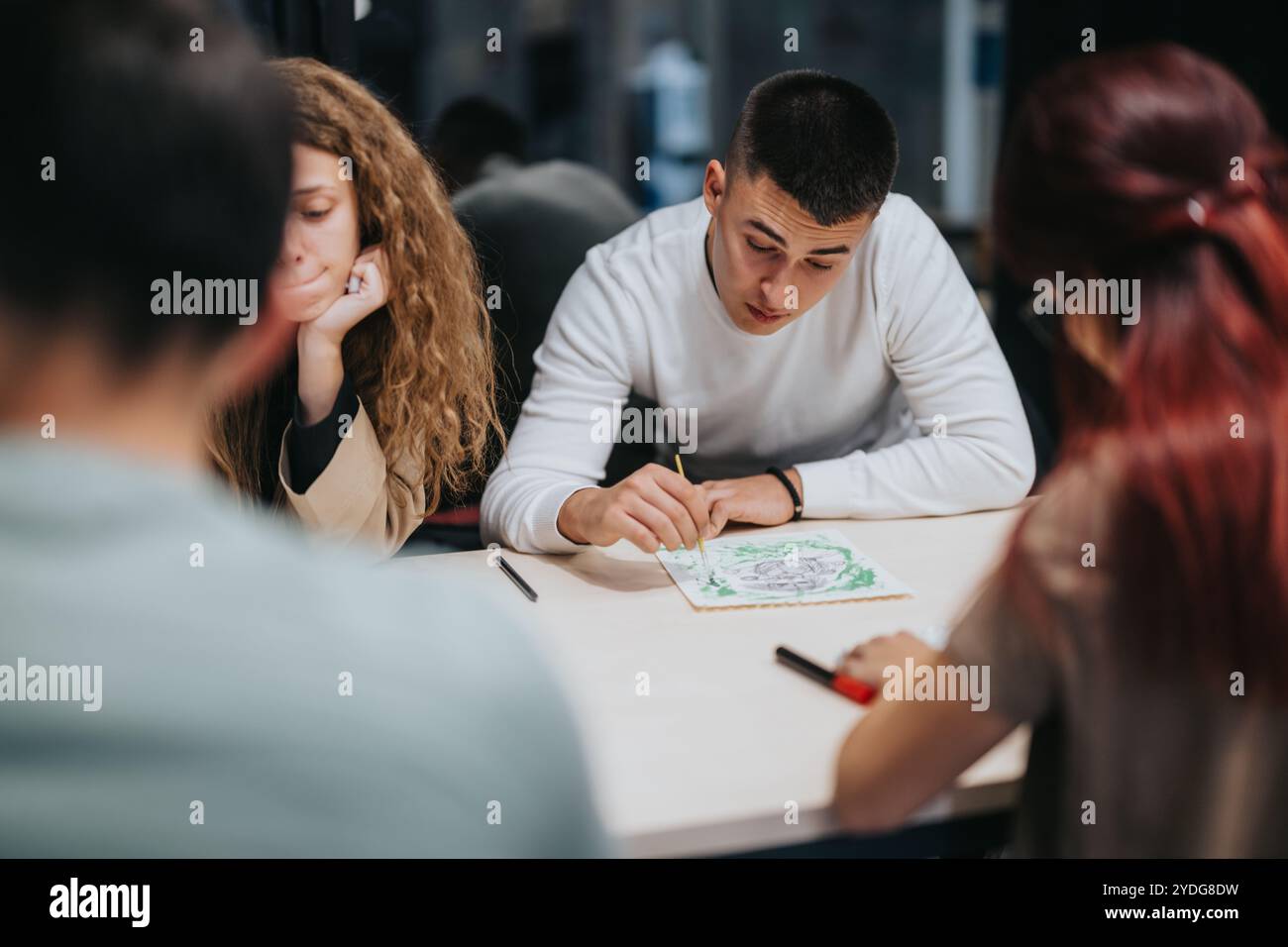 Group teens work together classroom hi-res stock photography and images ...