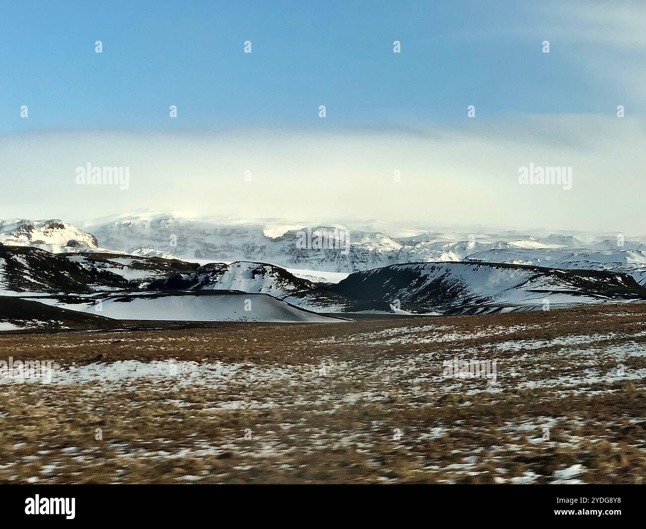 Panoramic view on Icelandic fjords and mountains in fog and clouds on a ...