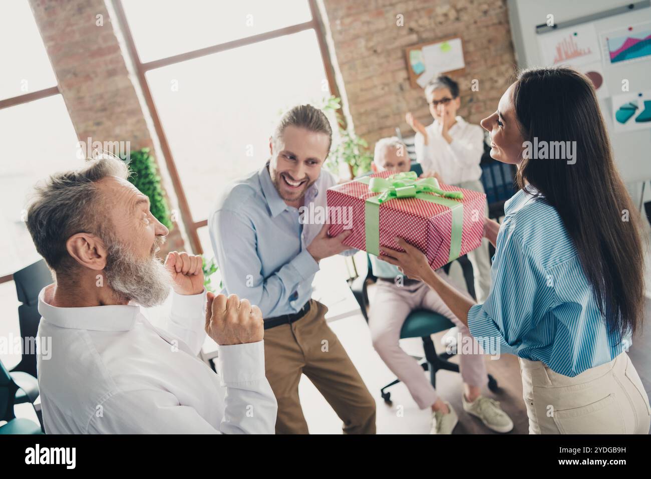 Photo of teamwork startup partners congratulate birthday gift ...