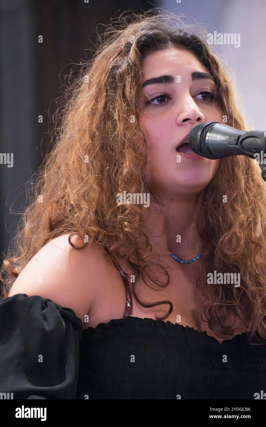 Live music in Souq Waqif during FIFA World Cup. A talented singer ...