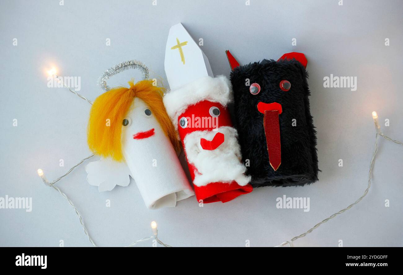 Saint Nicholas, Angel and Devil made by a child from toilet paper roll ...