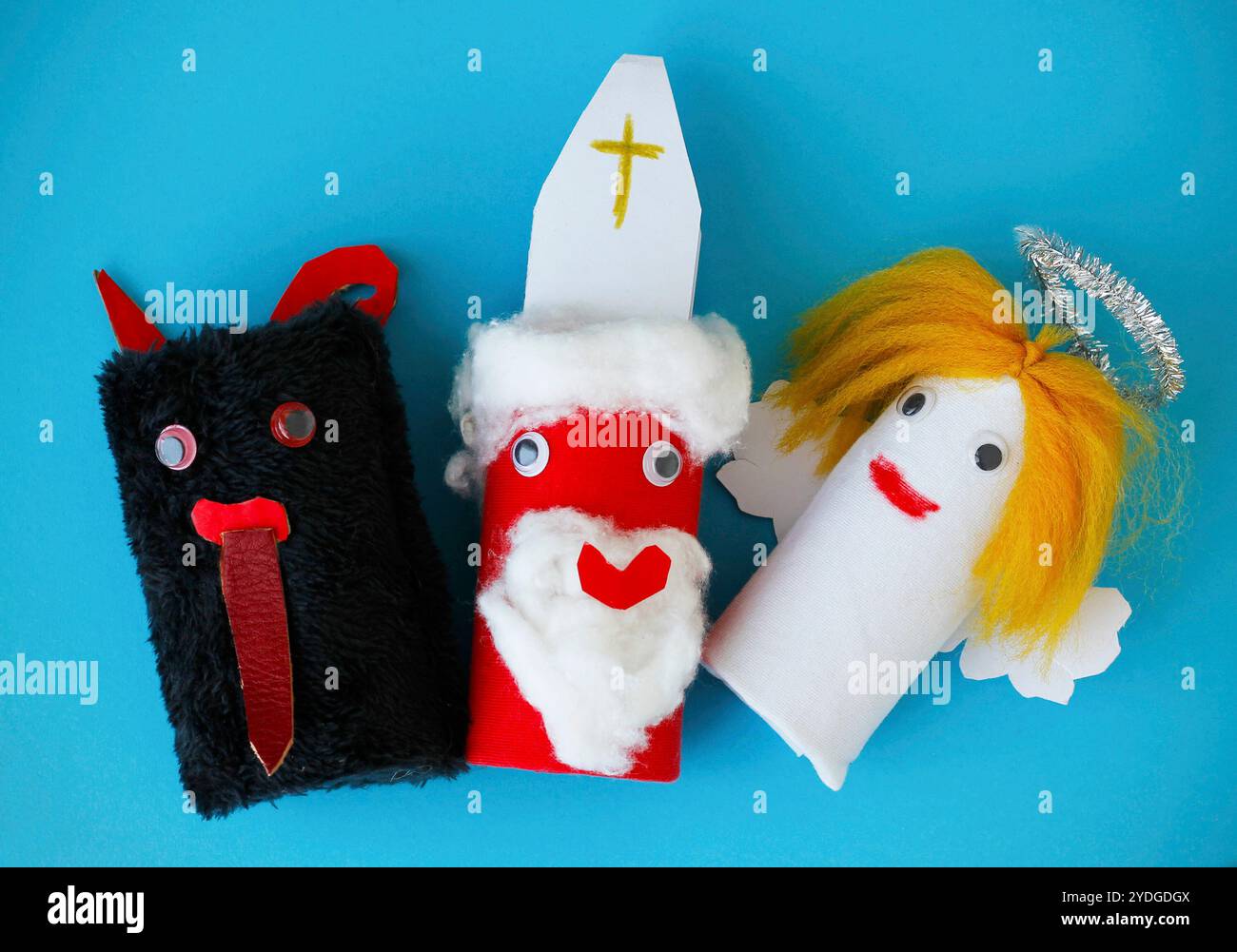 Saint Nicholas, Angel and Devil made by a child from toilet paper roll ...