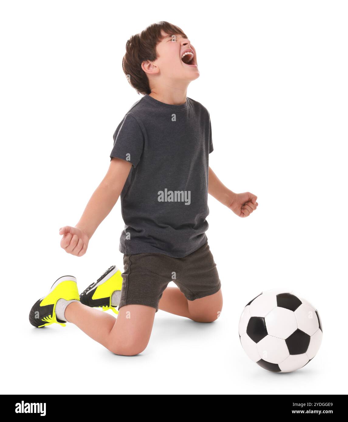 Emotional football player with soccer ball on white background Stock ...