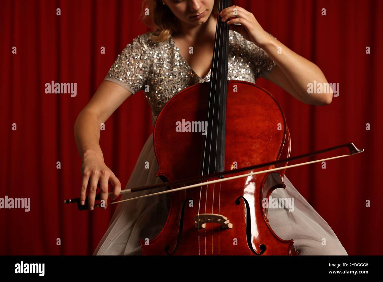 Professional cellist playing on stage hi-res stock photography and ...