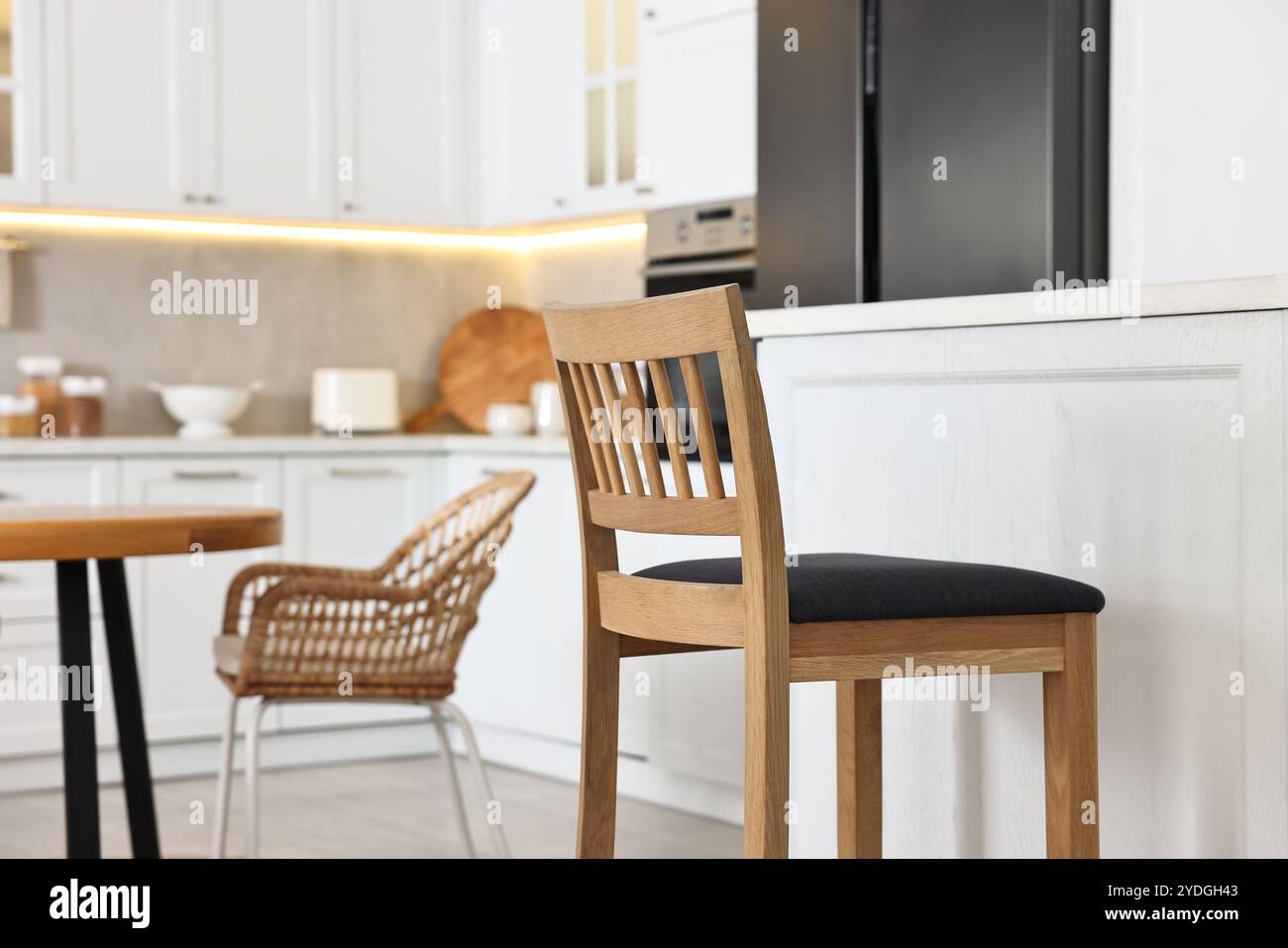 Stylish kitchen with bar stool. Interior design Stock Photo - Alamy