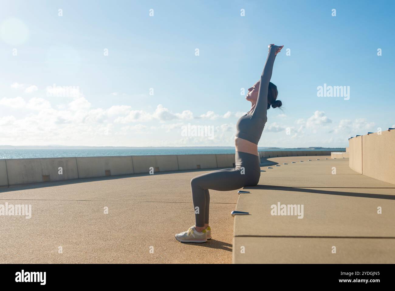 Stretching seated hi-res stock photography and images - Alamy