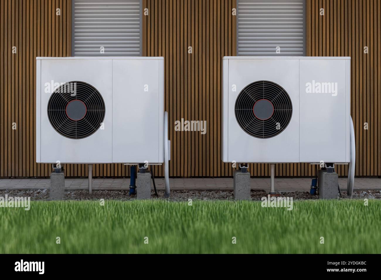 Outdoor Heat Pumps on Modern Building Wall Stock Photo - Alamy