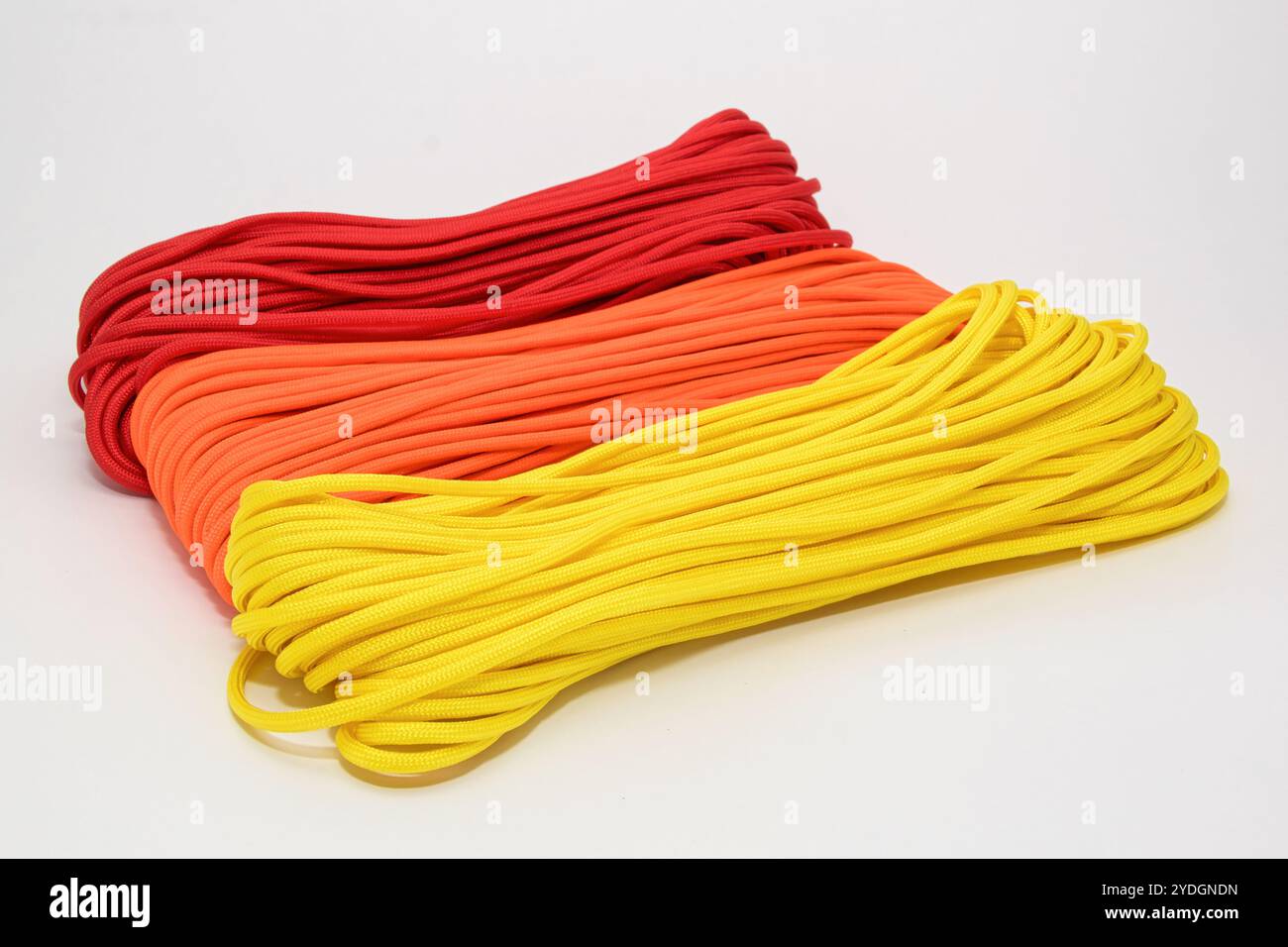 Red, Orange, and Yellow Paracord Rope Bundle Stock Photo - Alamy