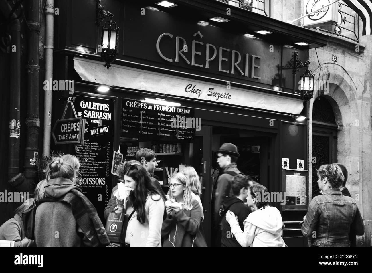 Eating crepe paris Black and White Stock Photos & Images - Alamy