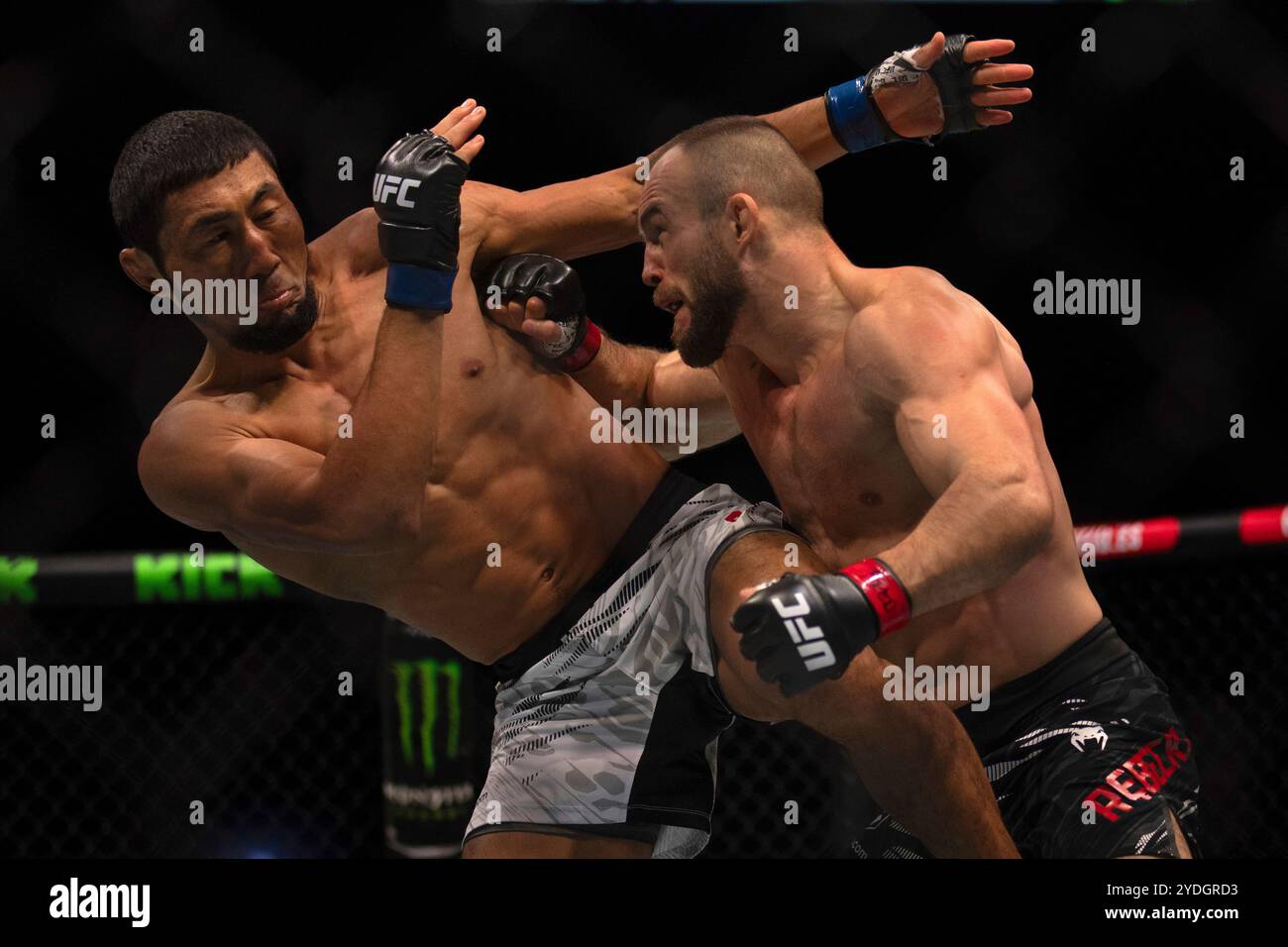 Myktybek Orolbai, left, fights with Mateusz Rebecki in a catchweight ...