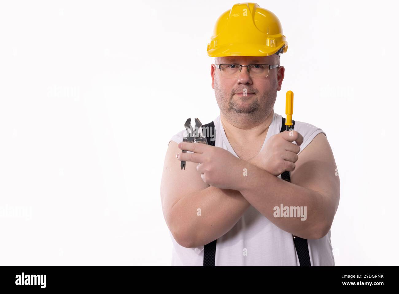A Construction Worker Equipped with Essential Tools and Wearing a Hard ...