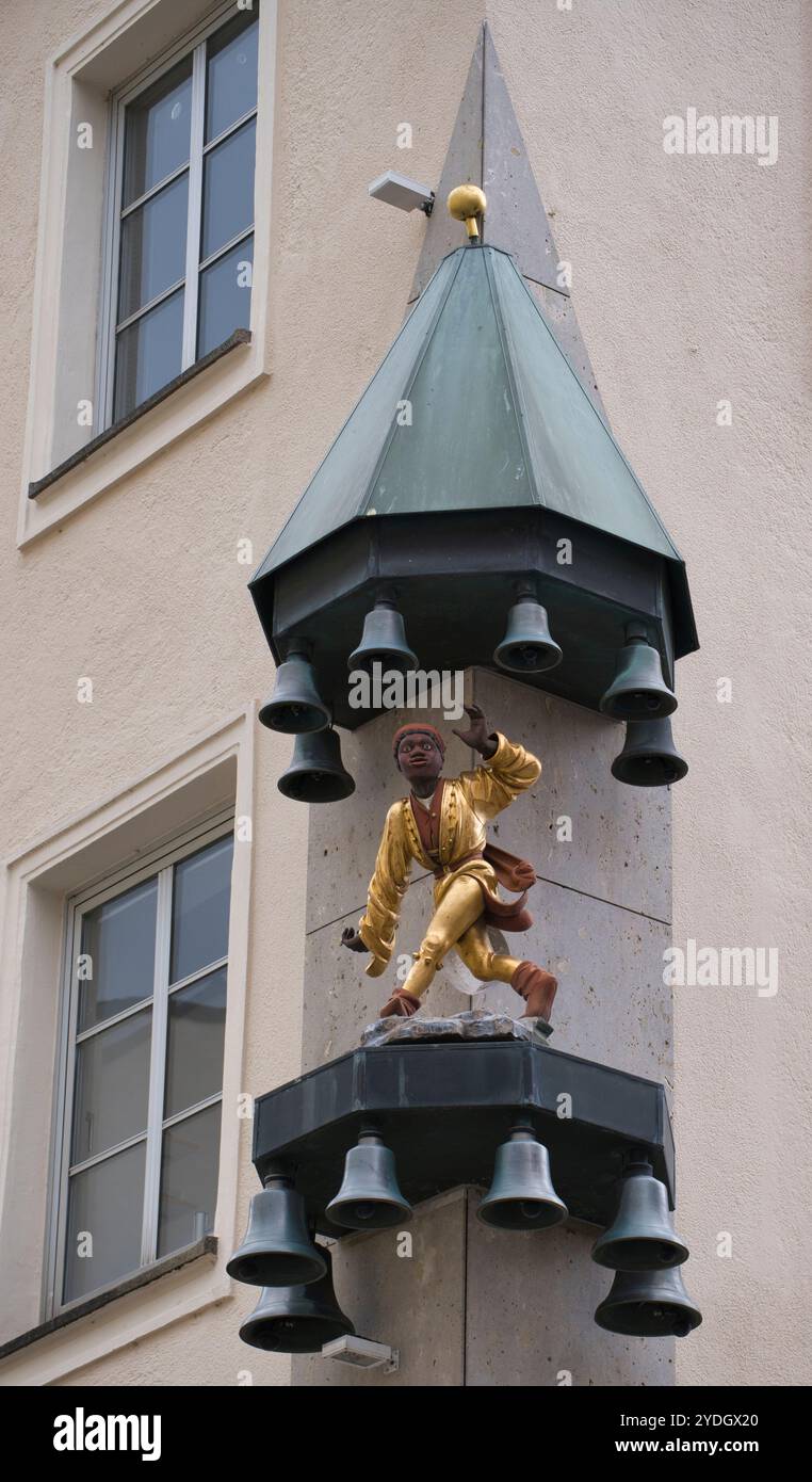 Funny statue at a building corner in Munich, Germany Stock Photo - Alamy