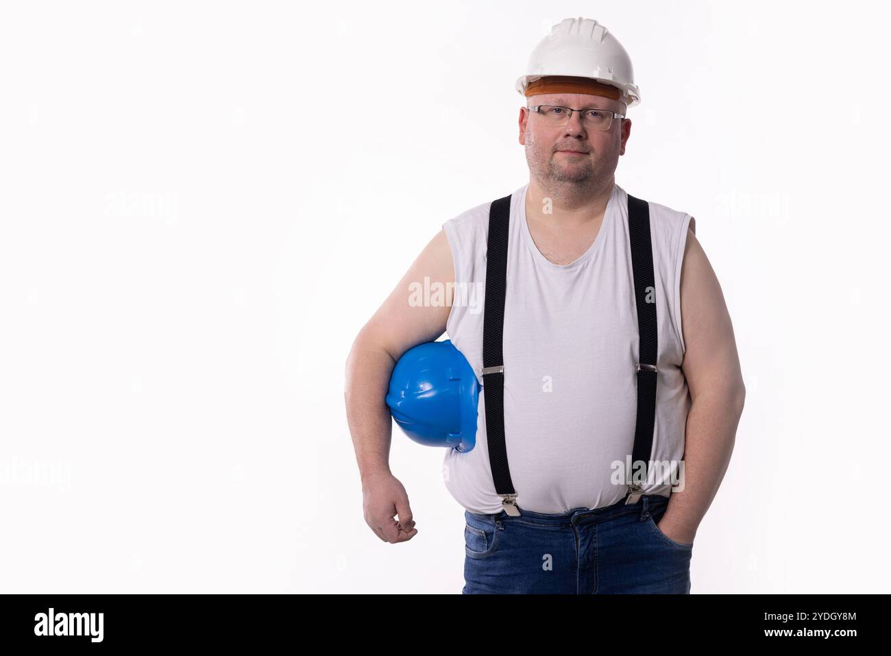 A Construction Worker Posing Proudly while Wearing a Hard Hat and ...