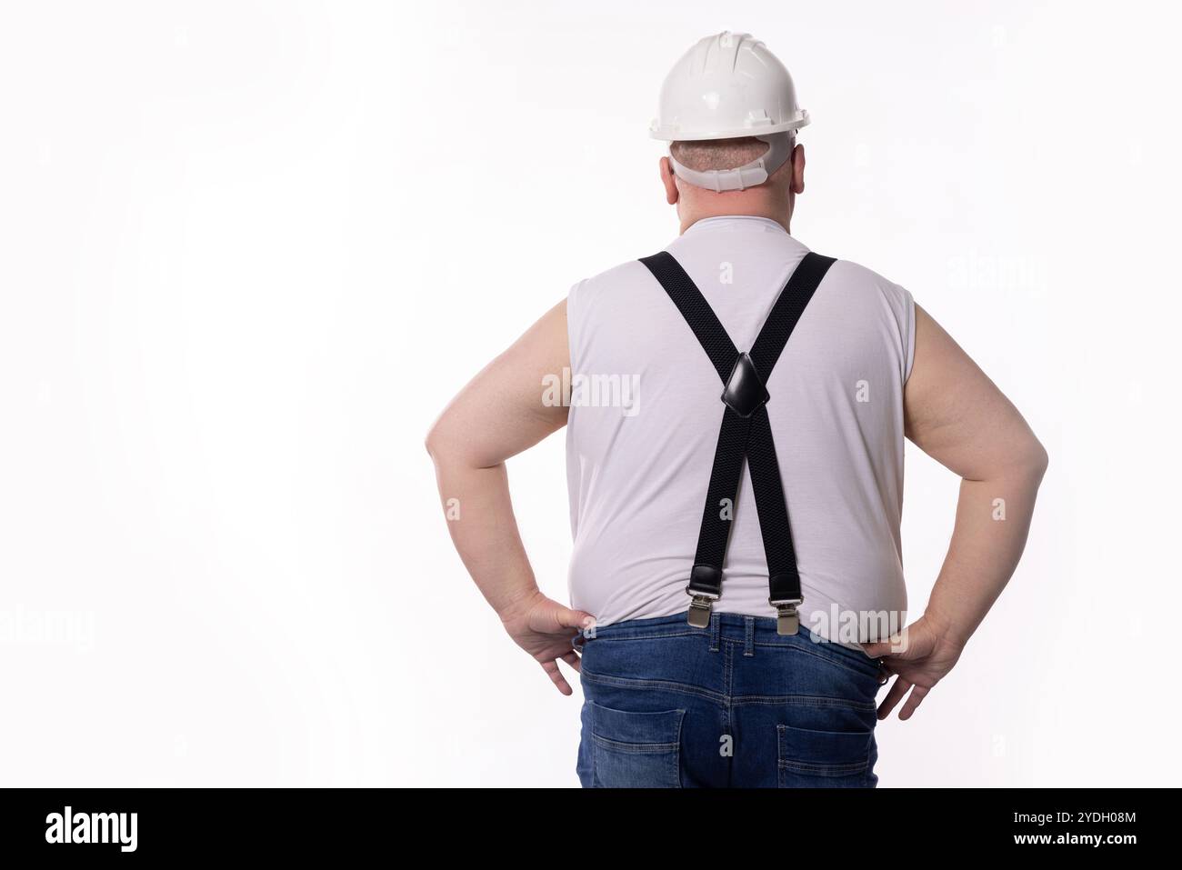 A dedicated Construction Worker in proper Safety Gear while performing ...