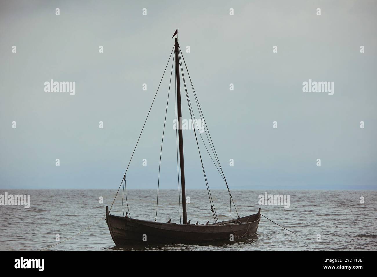 Ancient Viking ship in the evening sea in Denmark Stock Photo - Alamy