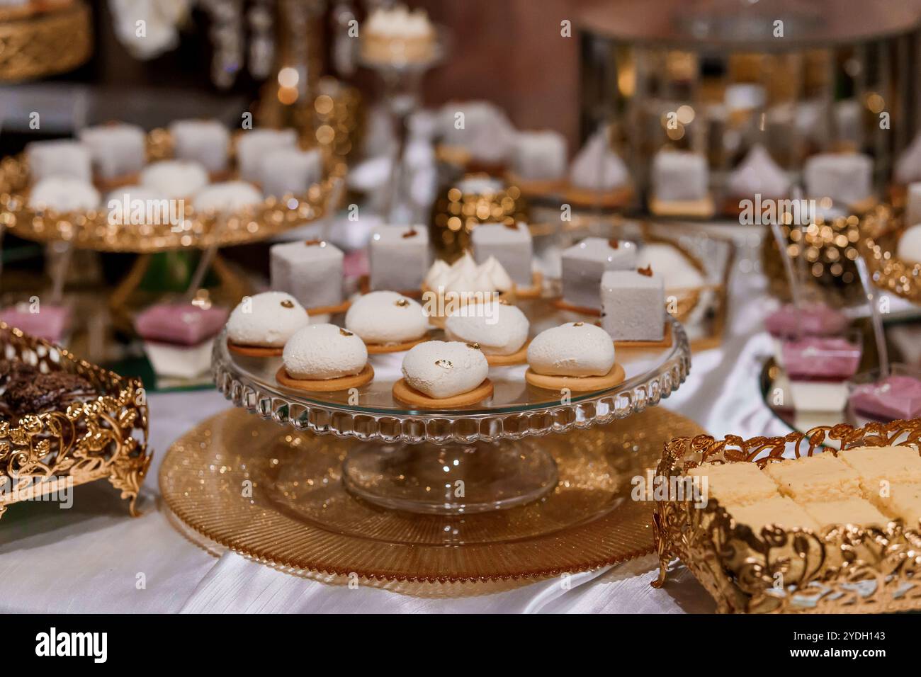 Elegant Dessert Display Featuring Assorted Confections on Ornate ...