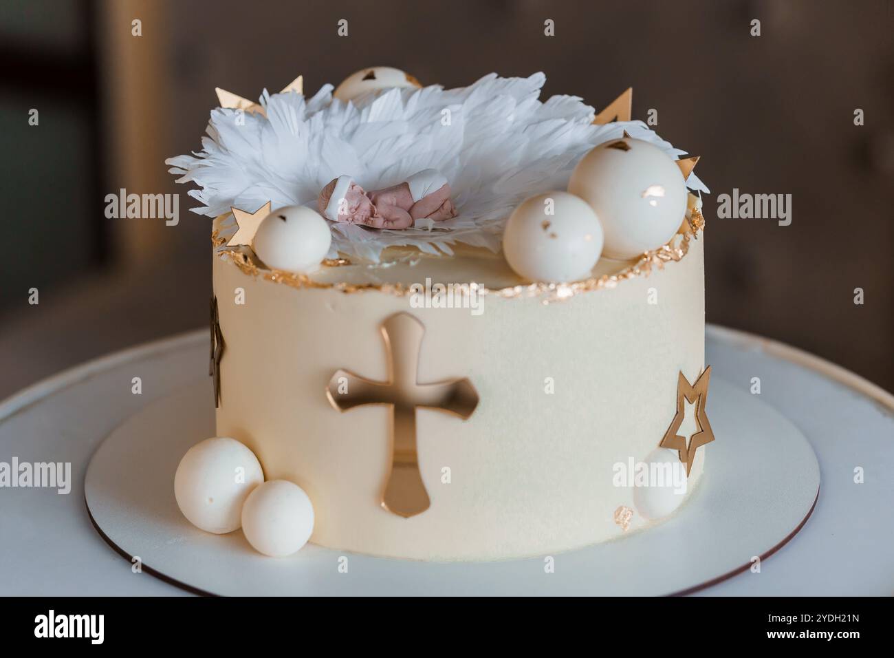 Elegant White Cake with Religious Symbolism for a Celebration Stock ...