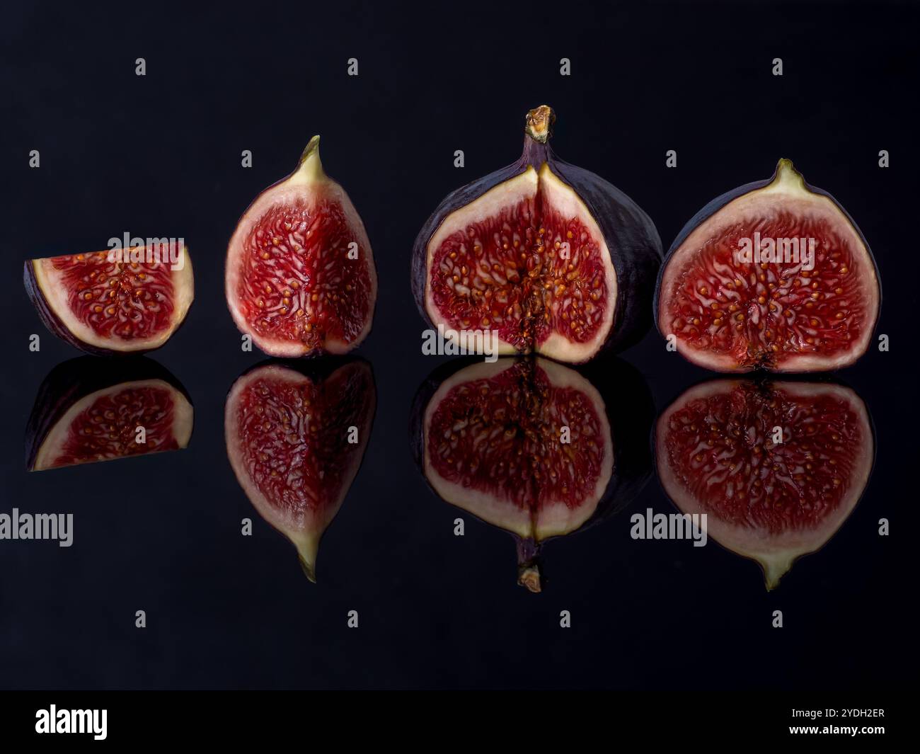 figs a group of fruits cut in half, rich in valuable minerals and ...