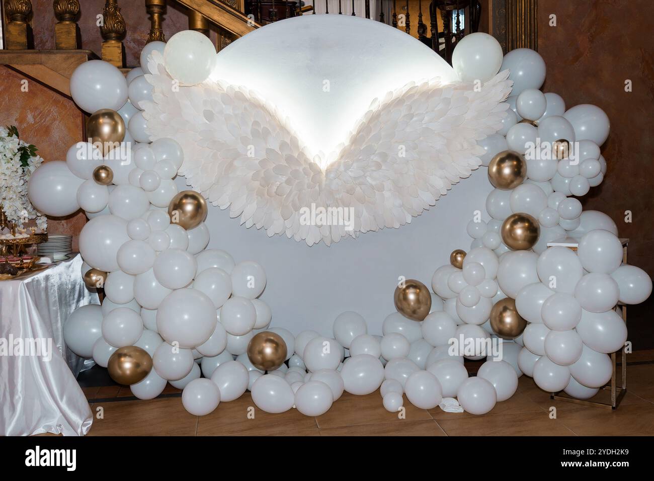 Elegant White Balloon Decoration with Angel Wings for Event Celebration ...