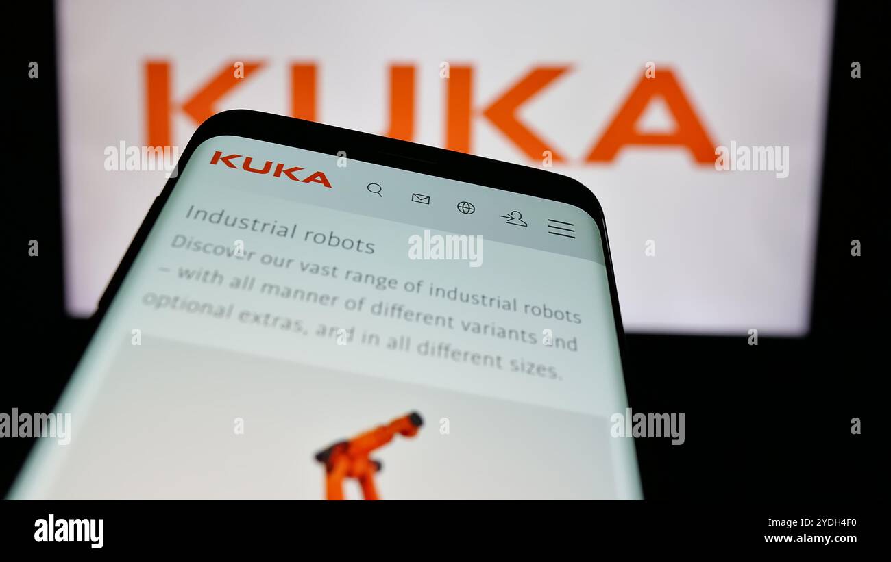 Mobile phone with website of German industrial automation company Kuka ...