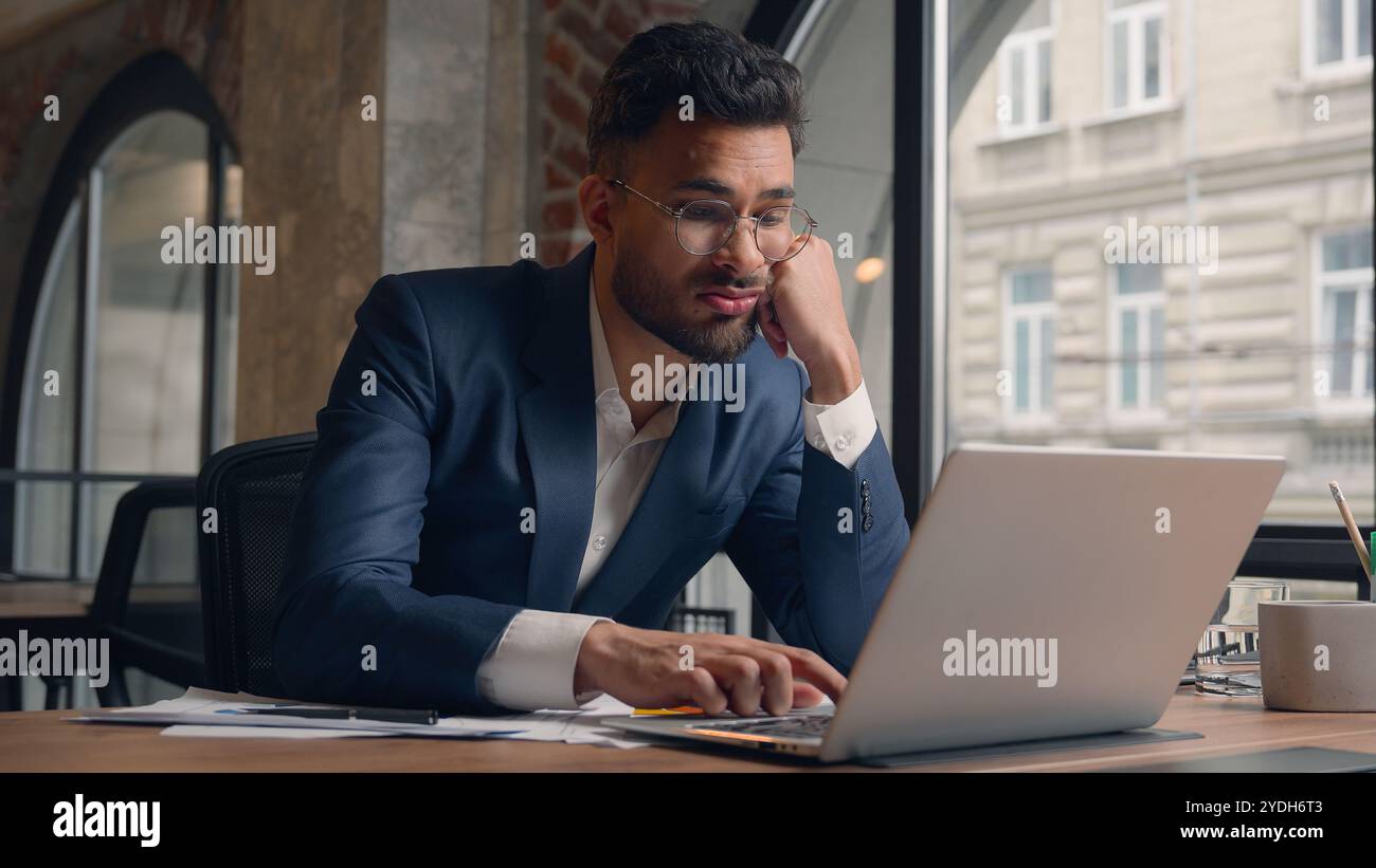 Bored lazy businessman typing on hi-res stock photography and images ...