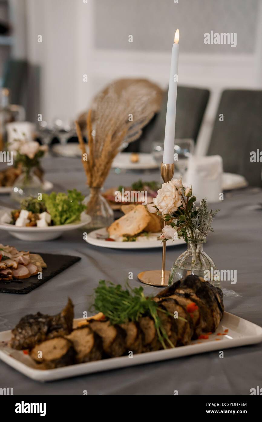 Elegant Dining Table with Gourmet Dishes and Candlelight Stock Photo ...