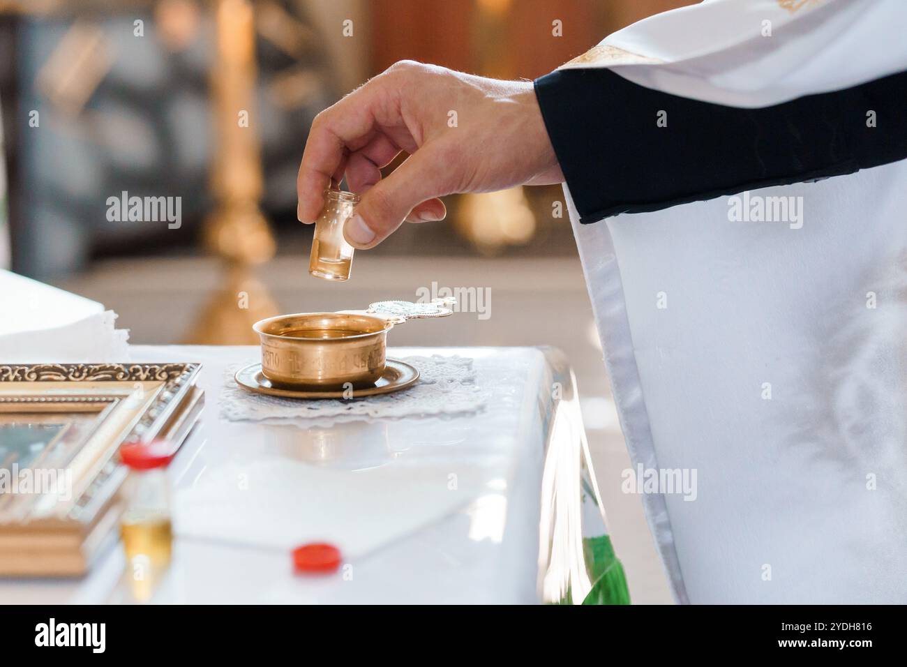 Holy oil anointment hi-res stock photography and images - Alamy