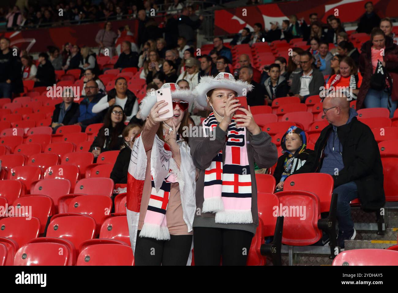 Young female football fans with scarves and phones England v Germany ...