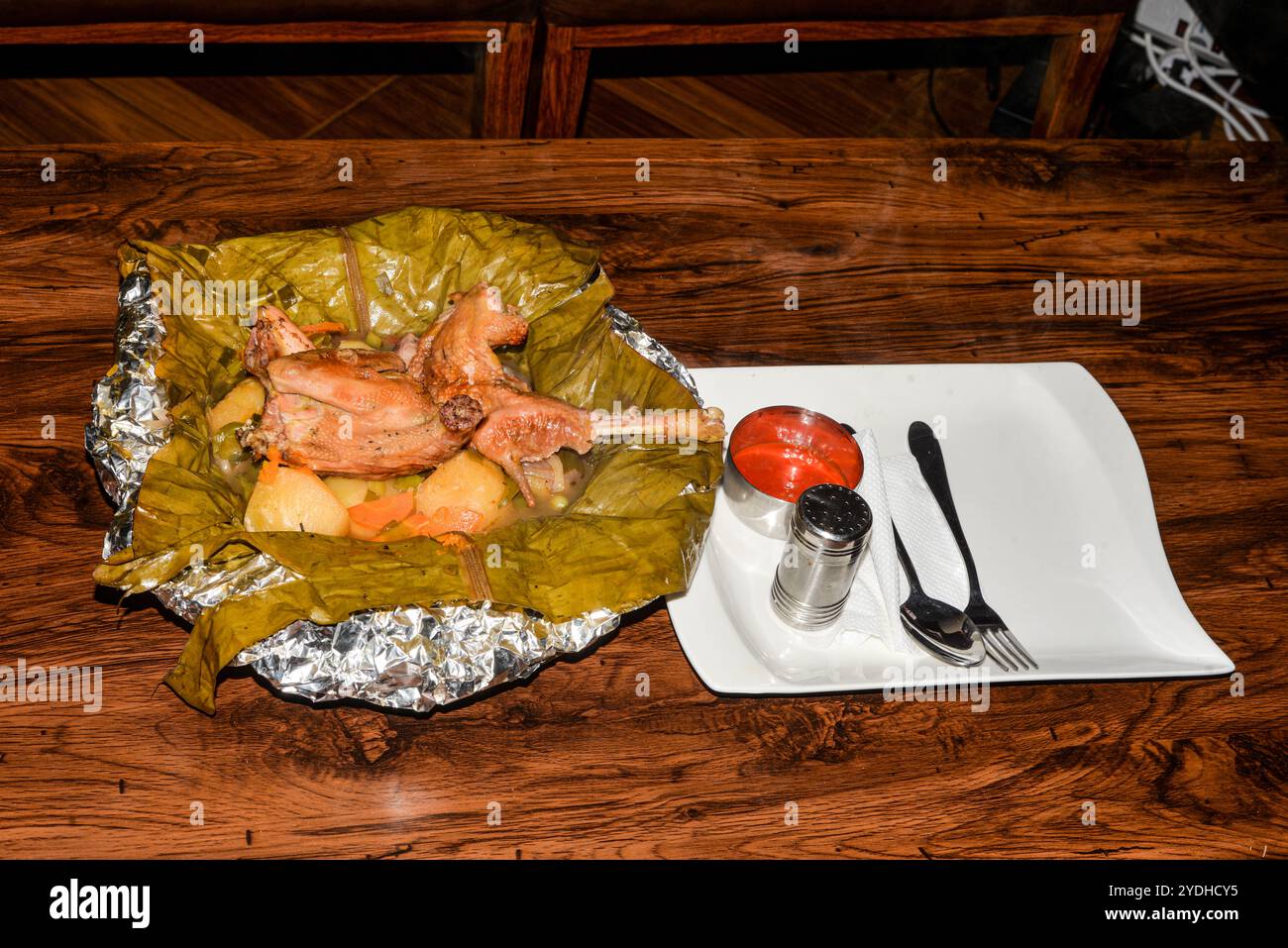 Chicken luwombo meal. The Luwombo is a Ugandan traditional cuisine ...