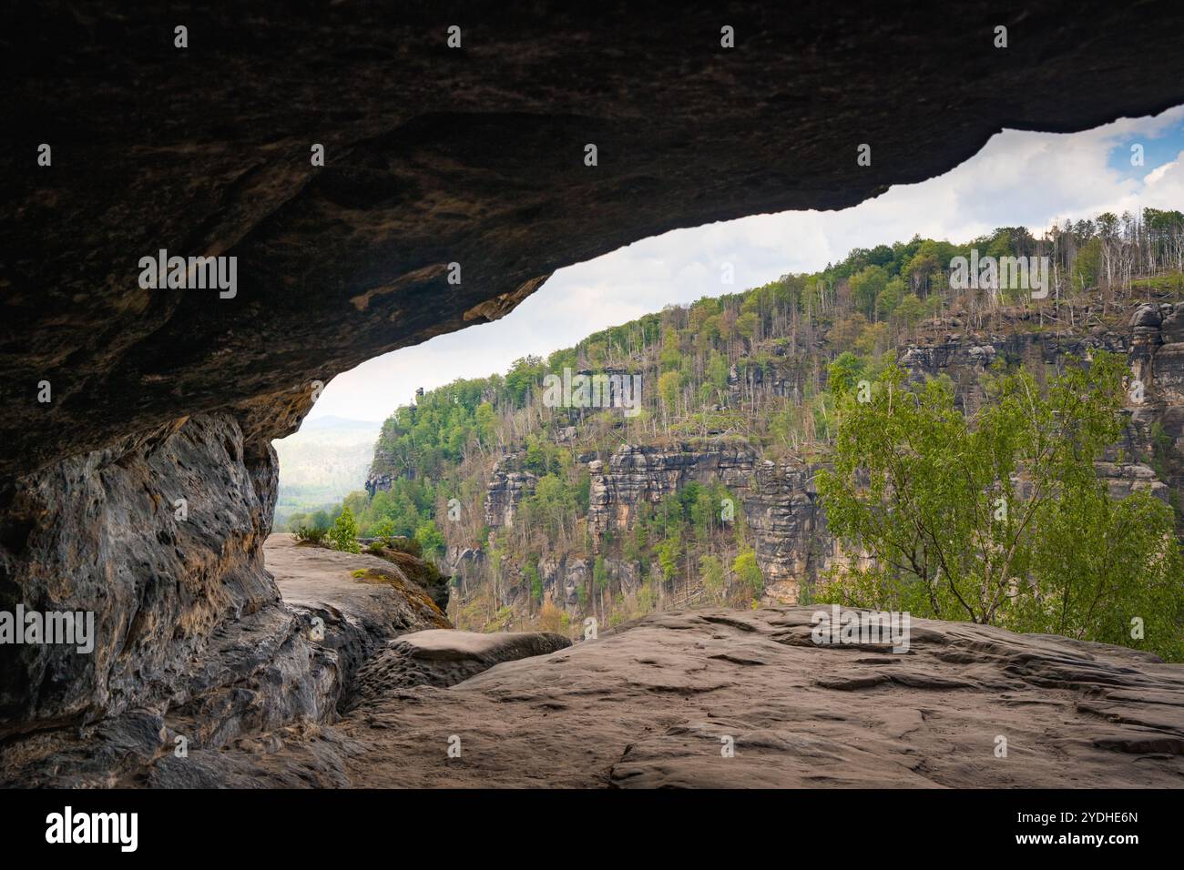 view from cave in mountain landscape Stock Photo - Alamy