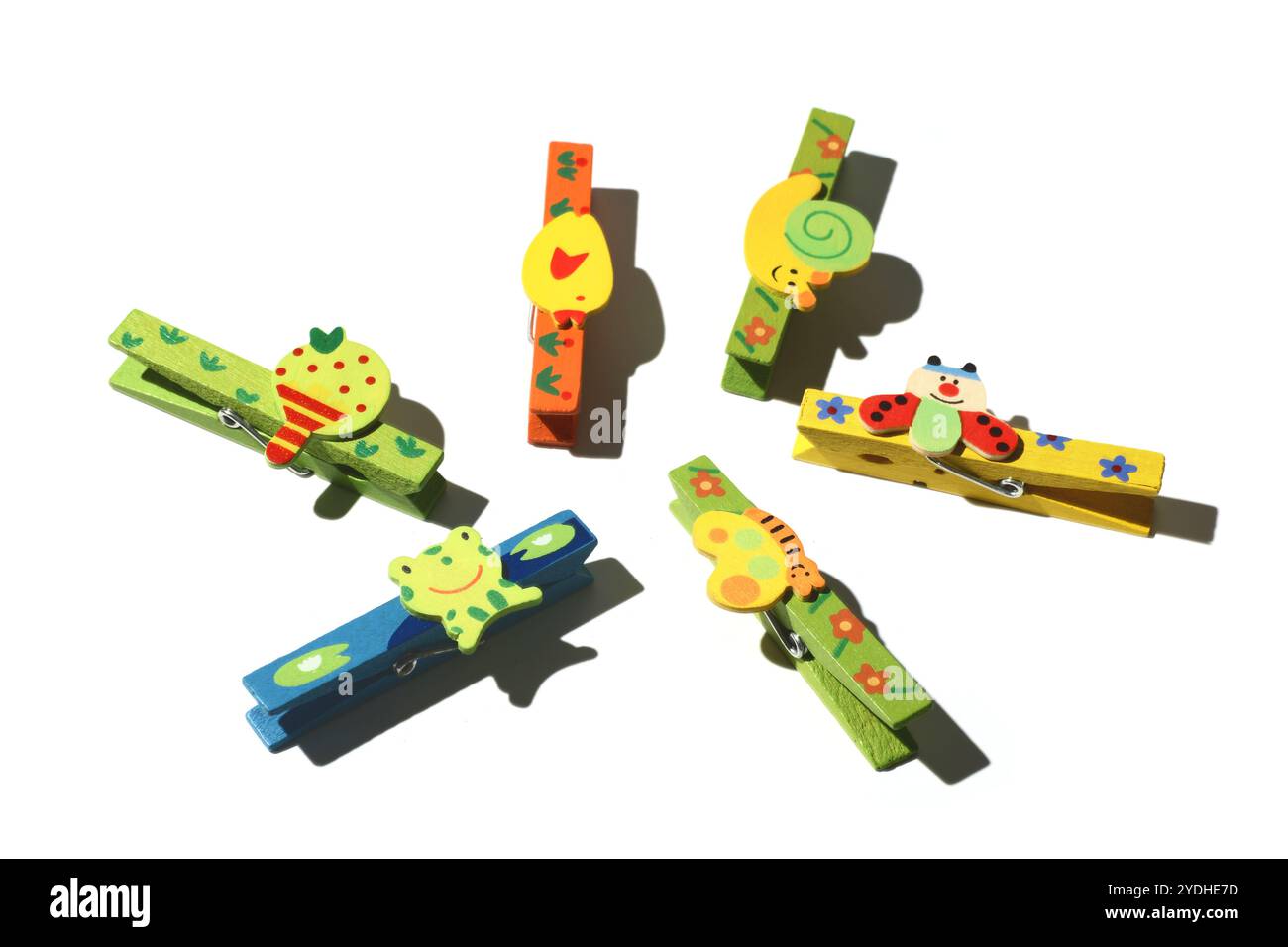 Wooden Pegs on White Background with Shadows Stock Photo - Alamy