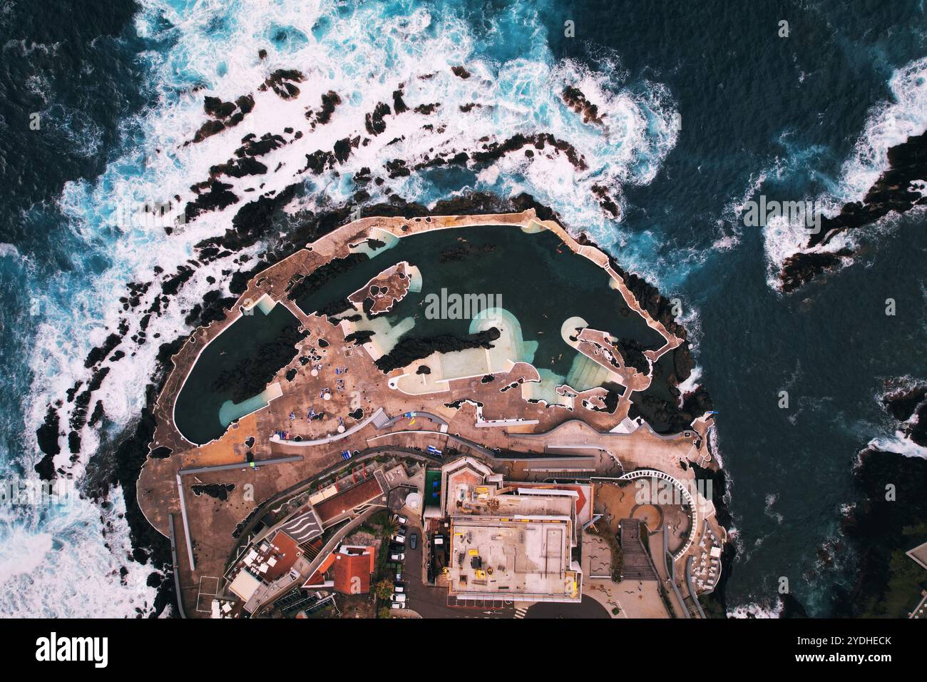 Aerial view of Porto Moniz with volcanic lava natural swimming pools ...