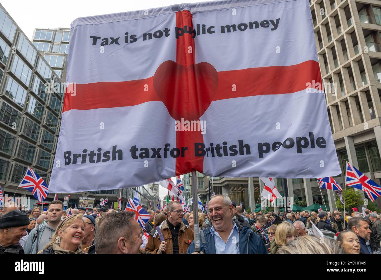 Britain First protester display a huge British tax for British people ...