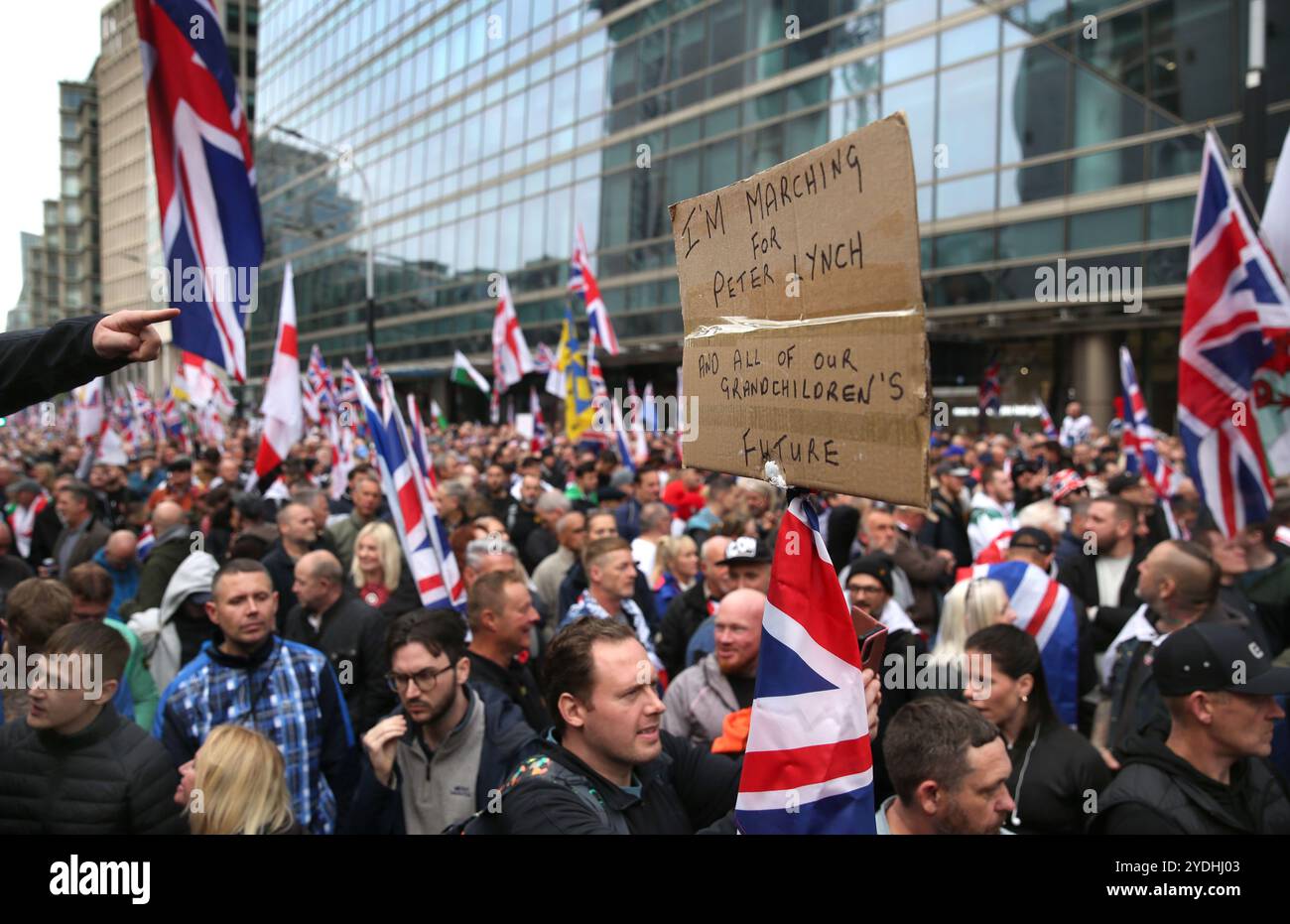 London, England, UK. 26th Oct, 2024. A protester holds a sign that ...