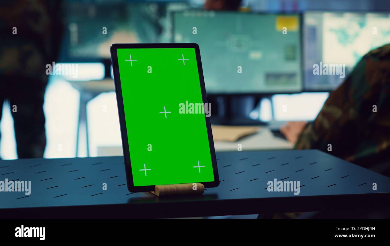 General headquarters monitoring room with a mockup screen on tablet ...