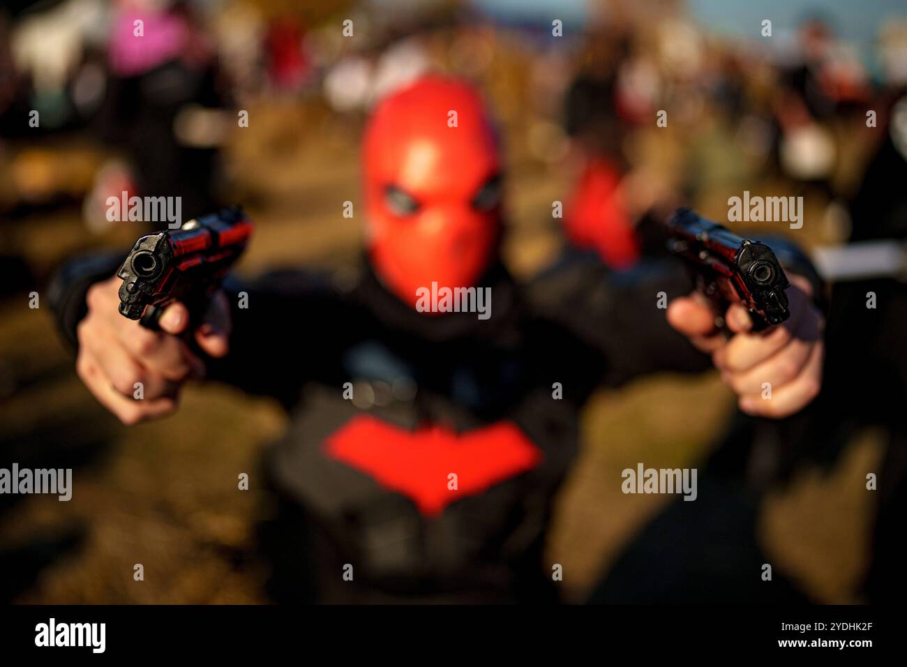 Vlad, wearing a costumes that depicts the Red Hood DC Comics character ...