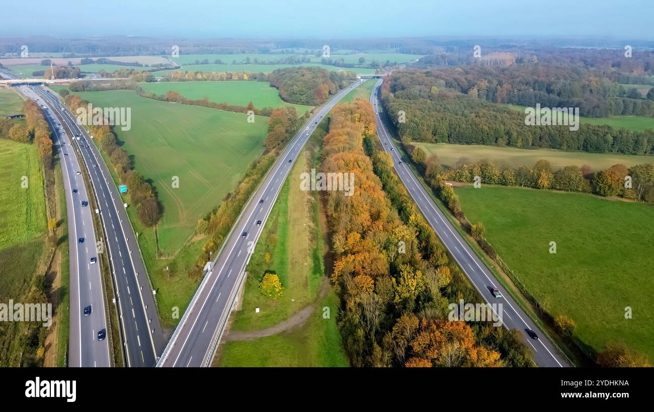 Aerial view on the A7 motorway in northern Germany between fields and ...