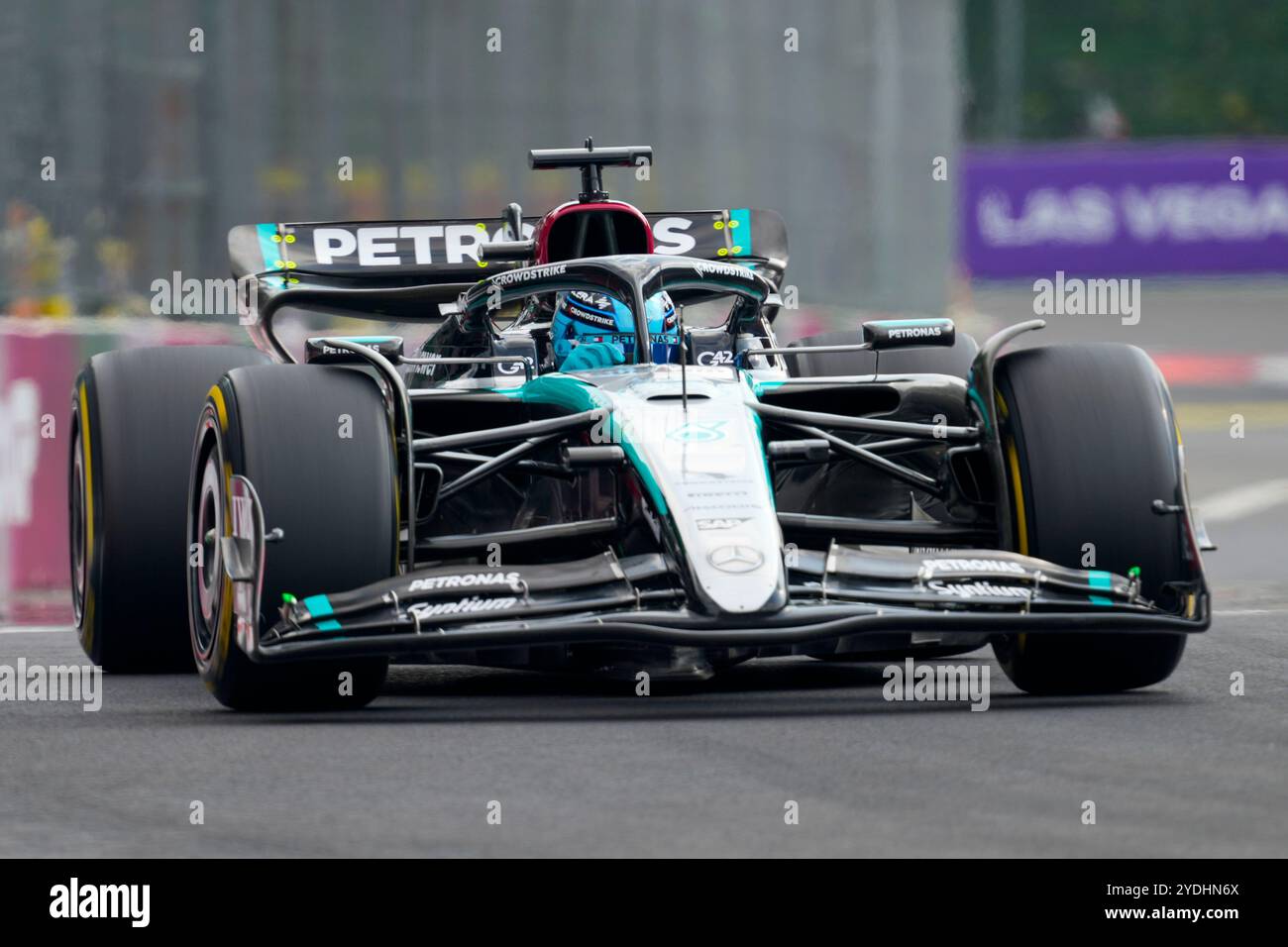 Mercedes driver George Russell, of Britain, competes for pole position ...