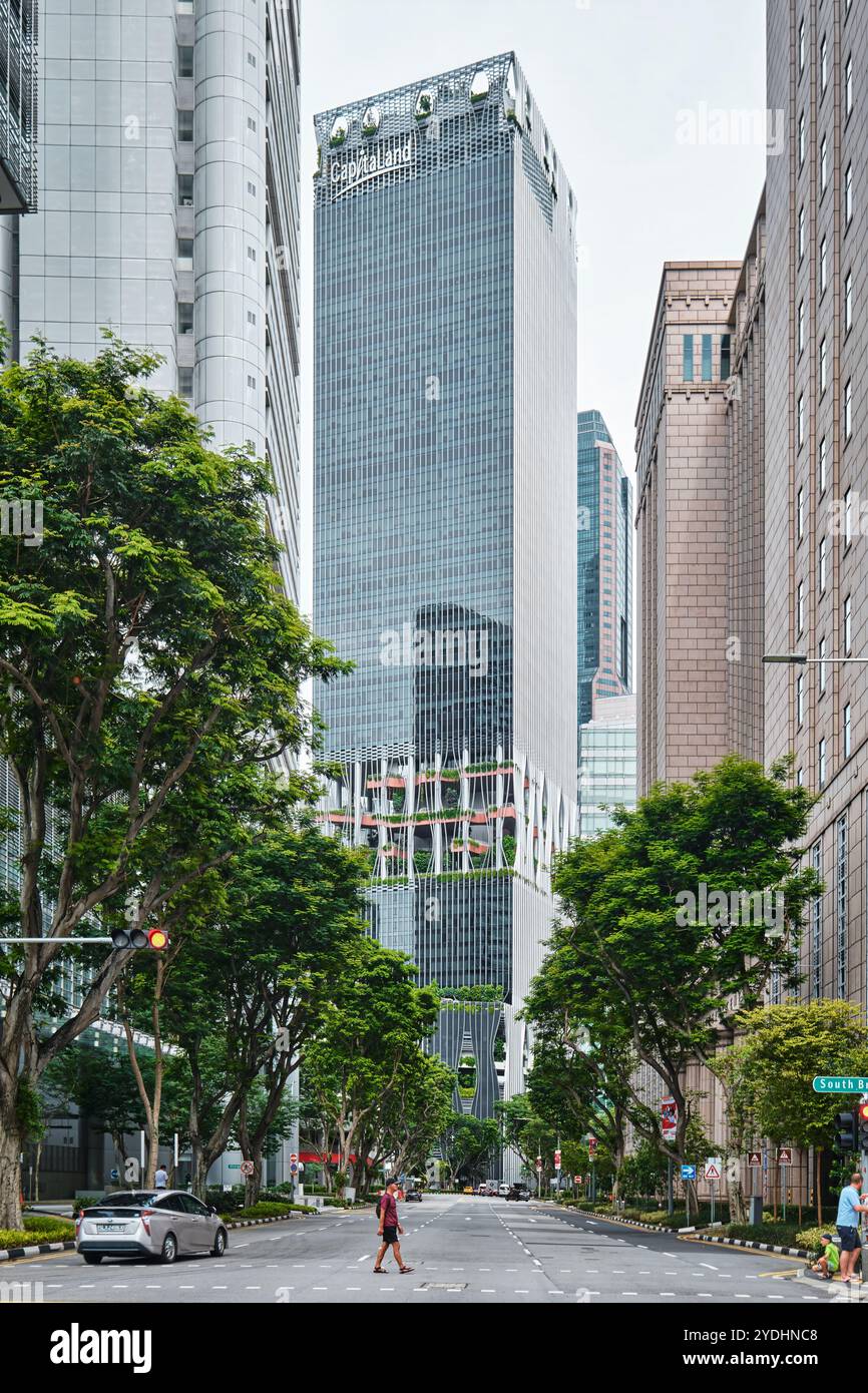 Singapore - August 12, 2024: CapitaSpring skyscraper with unique ...