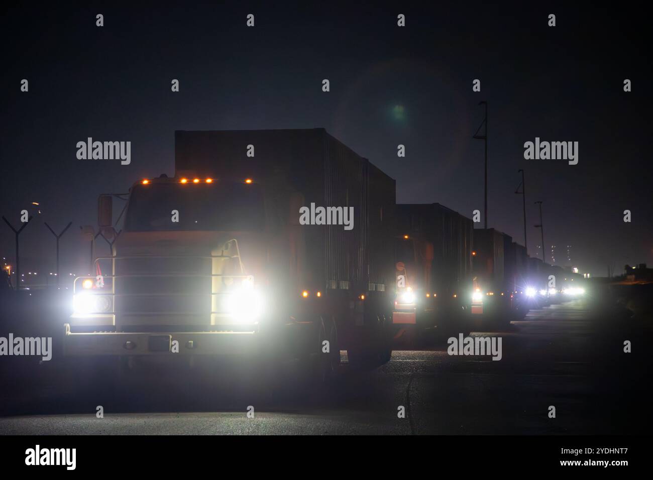 U.S. Army motor transport operators, assigned to 1483rd Transportation Company, conduct convoy ...