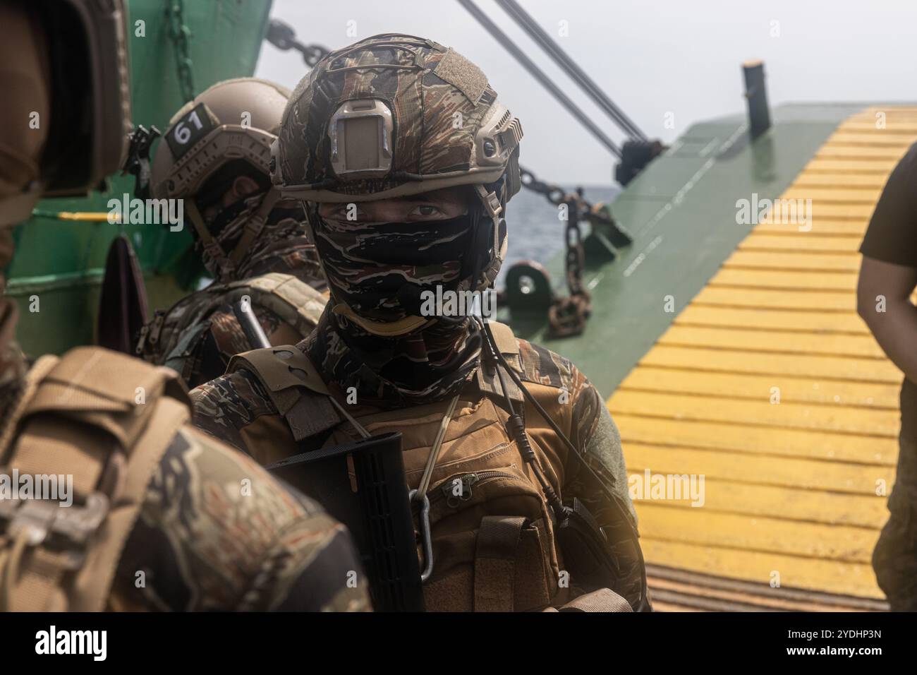 Armed Forces of the Philippines (AFP) service members conduct a ...
