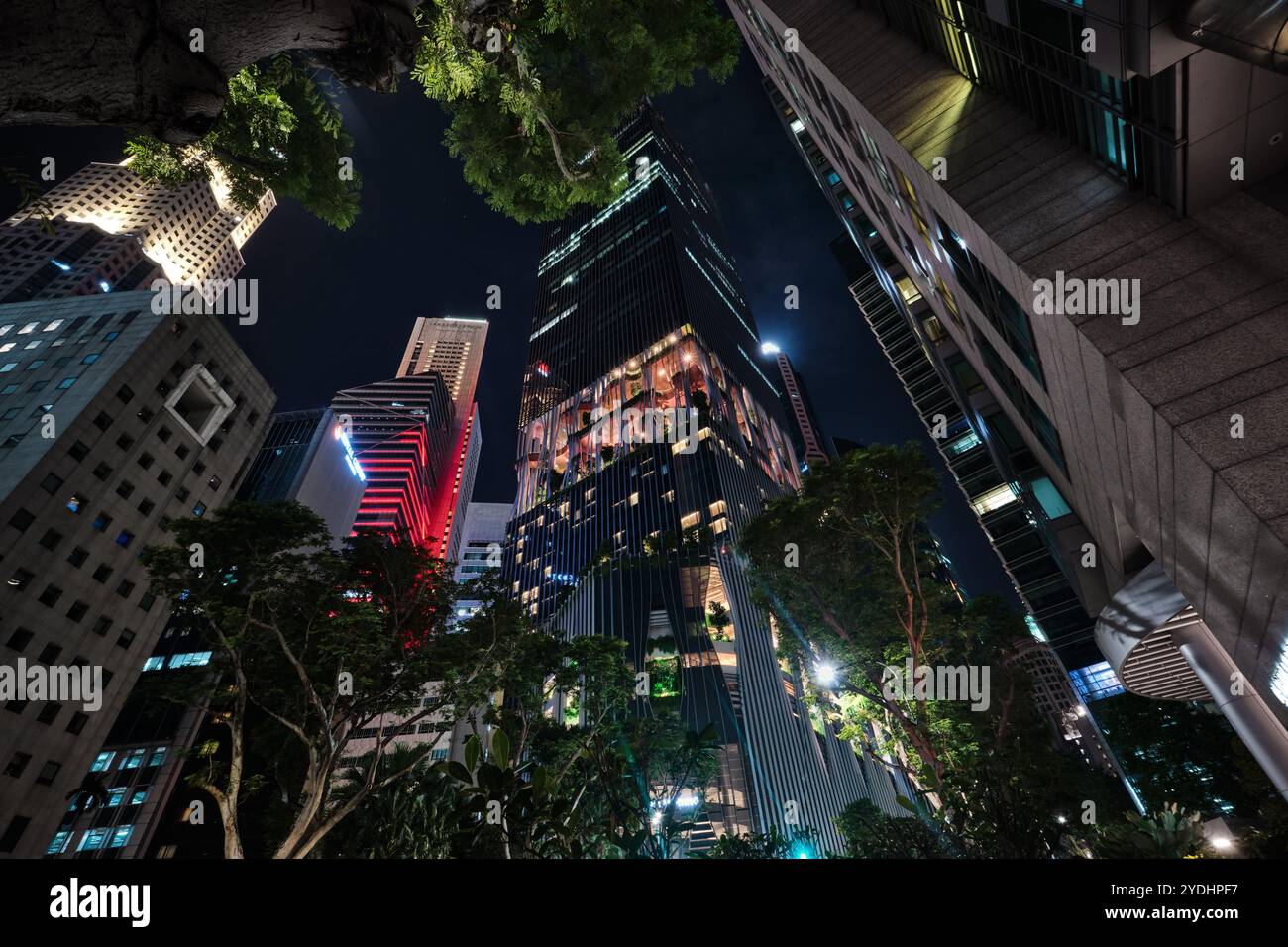 Singapore - August 12, 2024: Night street view of CapitaSpring ...